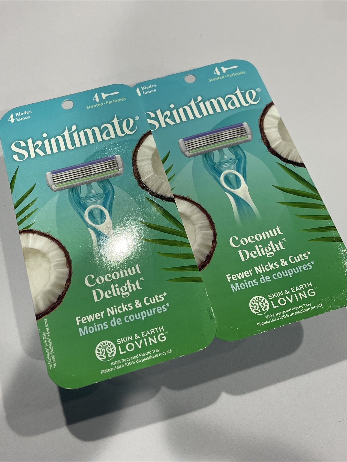 Skintimate Women's Disposable Razors Coconut Delight scent 4 razors. (2 ...