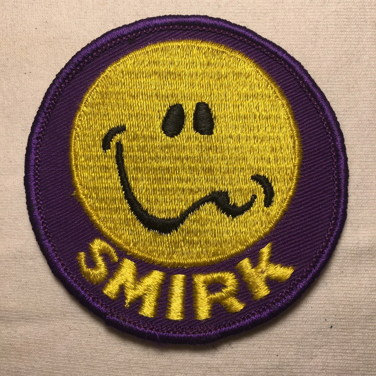 Smirk Smiley