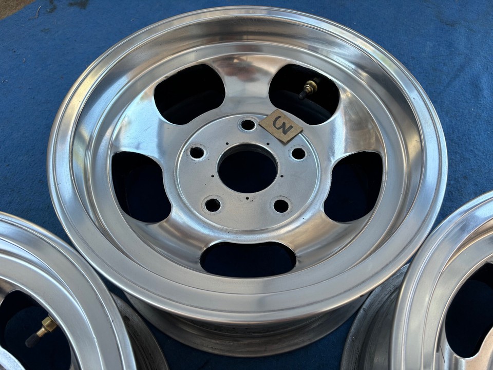 (4) 15" VINTAGE SLOT MAG WHEELS 15x7 RIMS 5x5.5 FORD DODGE F100 F150 ...