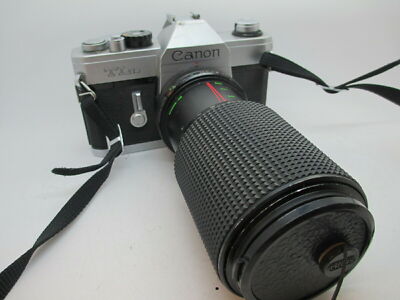 Canon TL 35mm SLR Film Camera W/ FD 200mm Zoom Lens Working Very Nice TESTED!!! | eBay