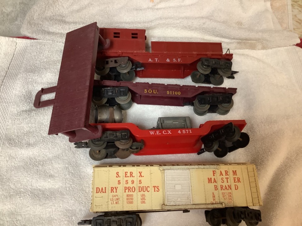 Marx W.E.C.X. 4571 spotlight car,caboose,cattle car, flatbed/4 cars as ...