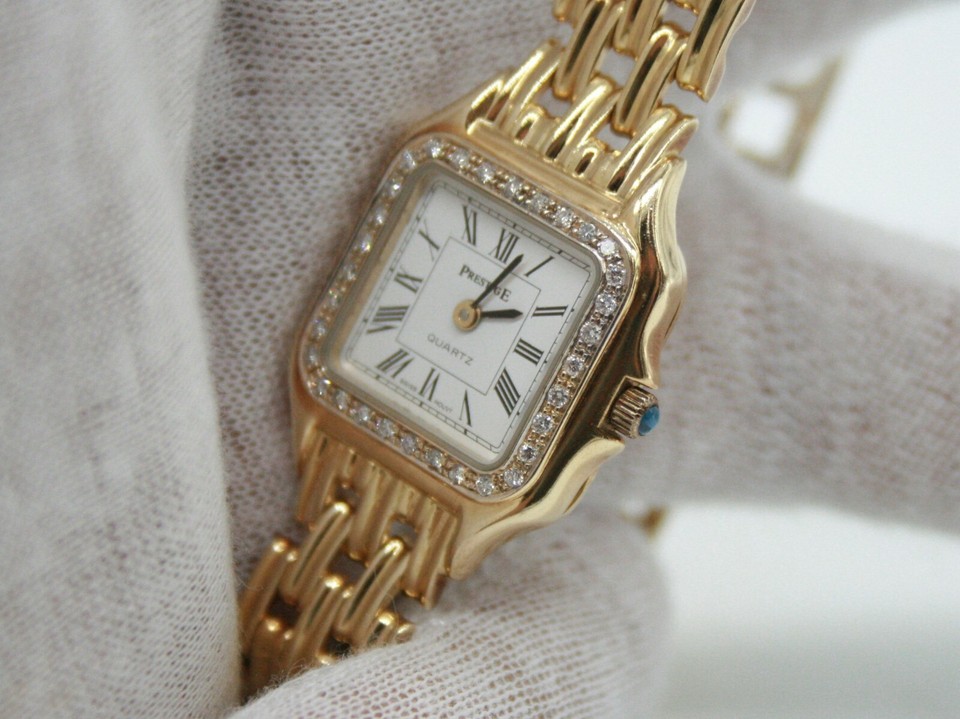 LADIES PRESTIGE 14K YELLOW GOLD QUARTZ SWISS MADE DIAMOND BEZEL 23MM ...