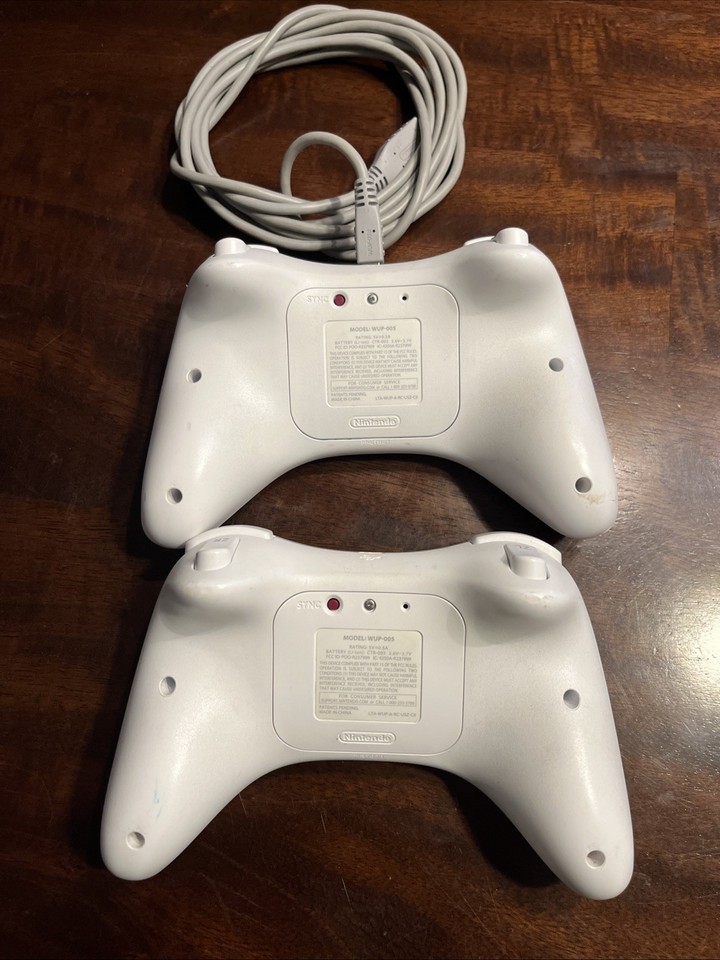 Nintendo Wii U Wireless Pro Controllers (2) with One Charging Cable | eBay