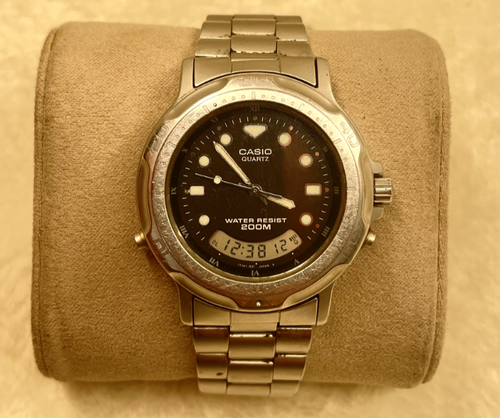 VINTAGE CASIO HAND WATCH (388)A0-702 JAPAN MADE ST. STEEL WR. 200 M ...