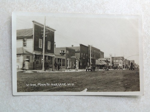 C67 Postcard RPPC W Side Main Street St Rice Lake WI Wisconsin | eBay