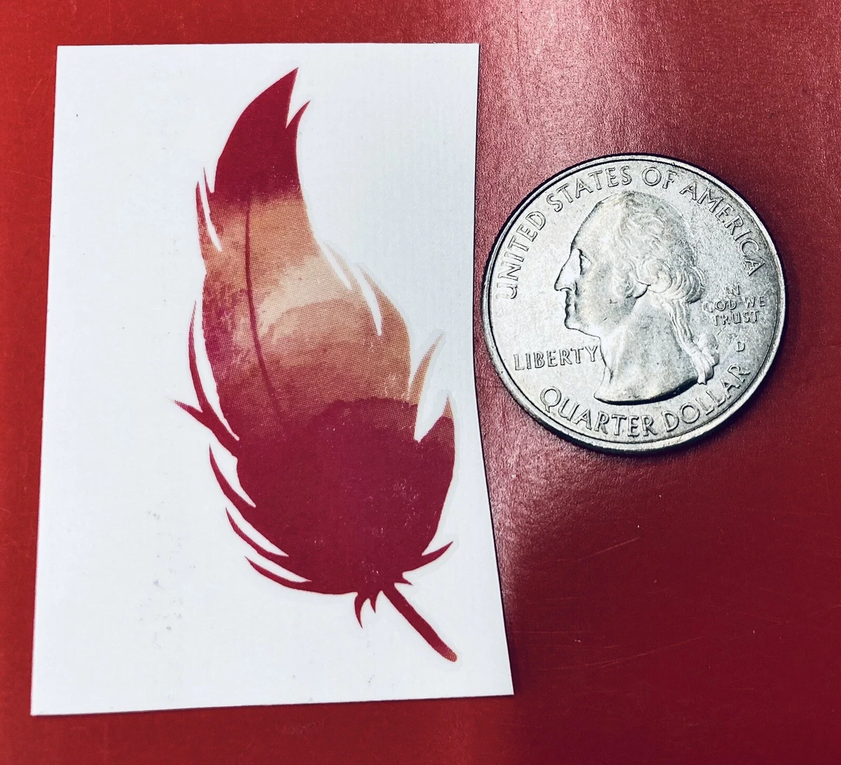 Cardinal Feather Tattoo