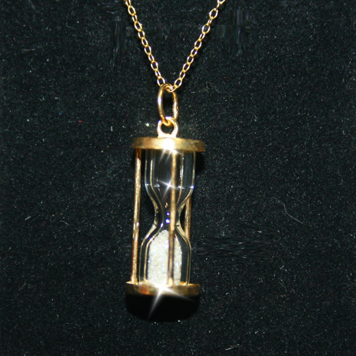 Diamond Dust Hourglass Pendant With