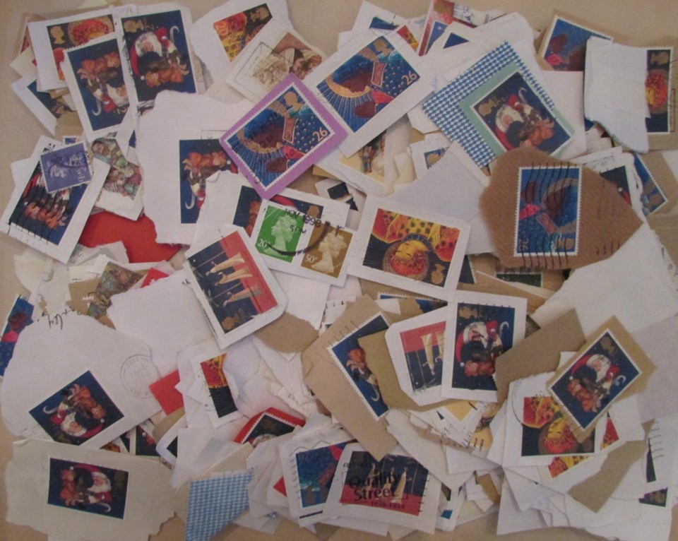 5 pounds of Worldwide stamps Box lot hoard on paper box filled to the ...