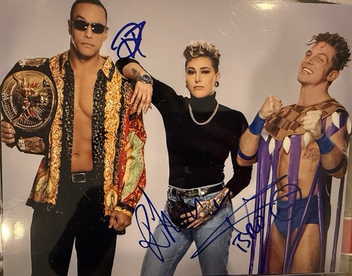 Rhea Ripley, Damian Priest, Matt Riddle Triple Signed Rock Tribute ...