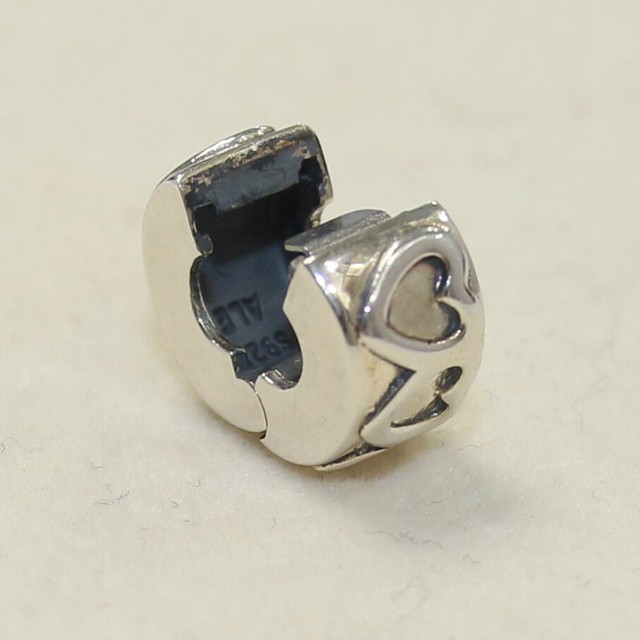 Authentic PANDORA S925 Ale Sterling Silver Row of Hearts Charm Clip ...