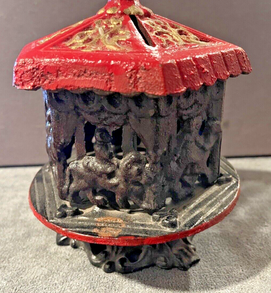Vintage Cast Iron Spinning Carousel Merry-Go-Round Penny Coin Bank ...