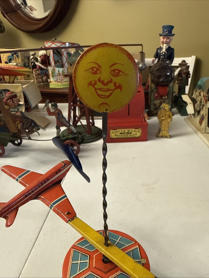 Tin Wind Up Two Planes Circling Up And Down Works Great!! | eBay