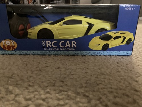 rc cars 1:20 yellow in box never been used in amazing condition remote ...