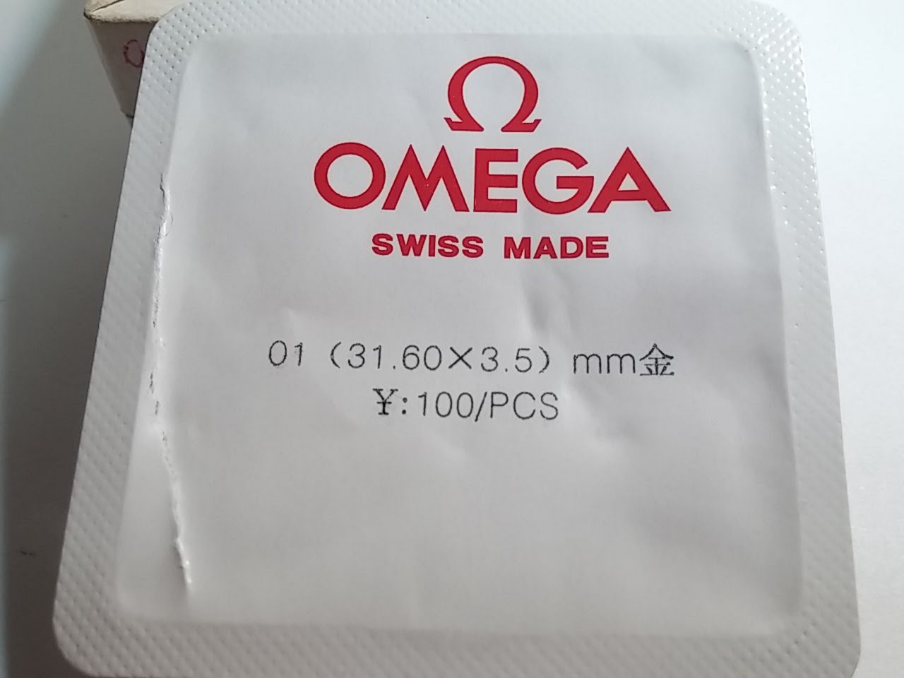 Genuine Omega watch crystal 31.60 x 3.5mm with gold-colored tension ...