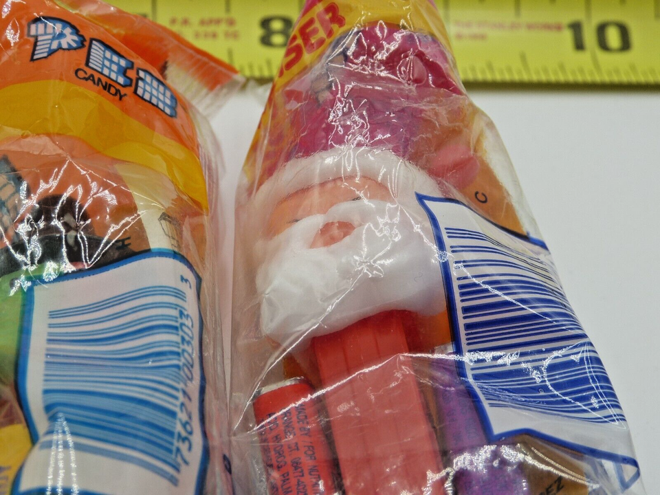 PEZ Witch w/green face & Skull w/purple base + Santa Claus. New in ...