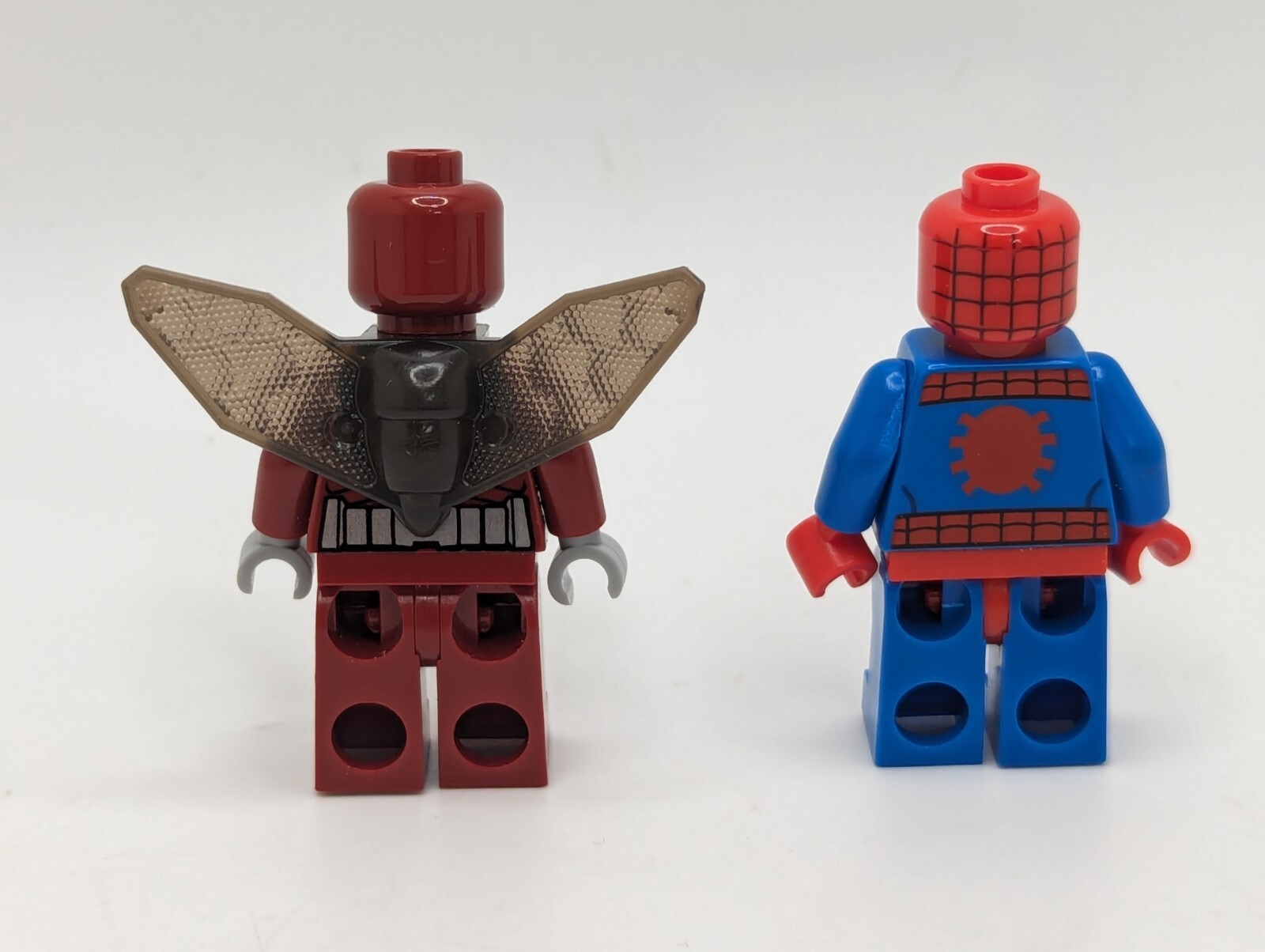 Lego Spiderman and The Beetle Minifigures from set 76005 Daily Bugle ...