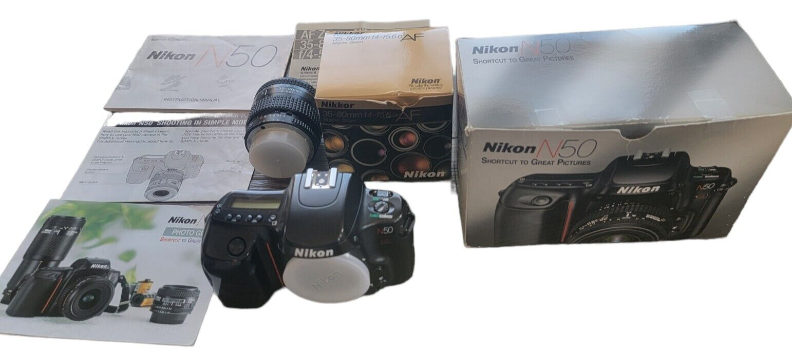 Nikon N50 35mm SLR Film Camera w/ Nikkor 35-80 MM Lens & books. | eBay