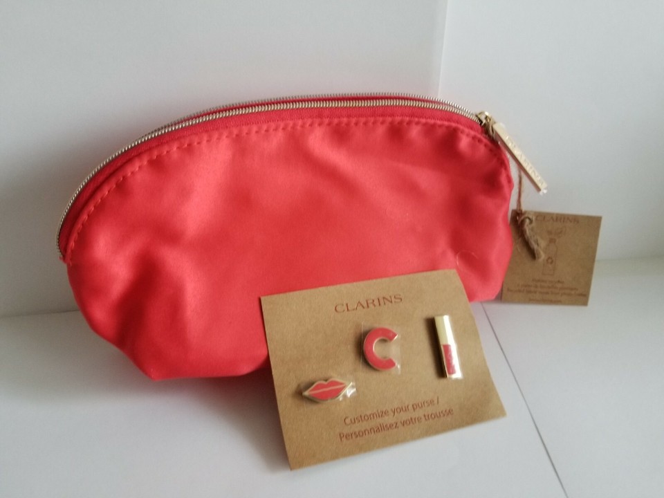 CLARINS PINK COSMETIC TRAVEL BAG WITH CLARINS LOGO PINS . BUY 1,2 OR 3 ...