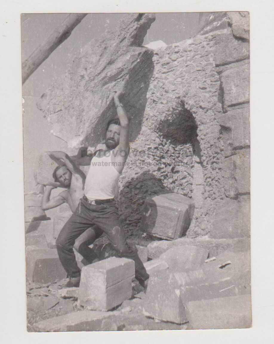 Two Men Carrying Stone Chunks Resembling Sisyphus Myth Unusual Snapshot ...