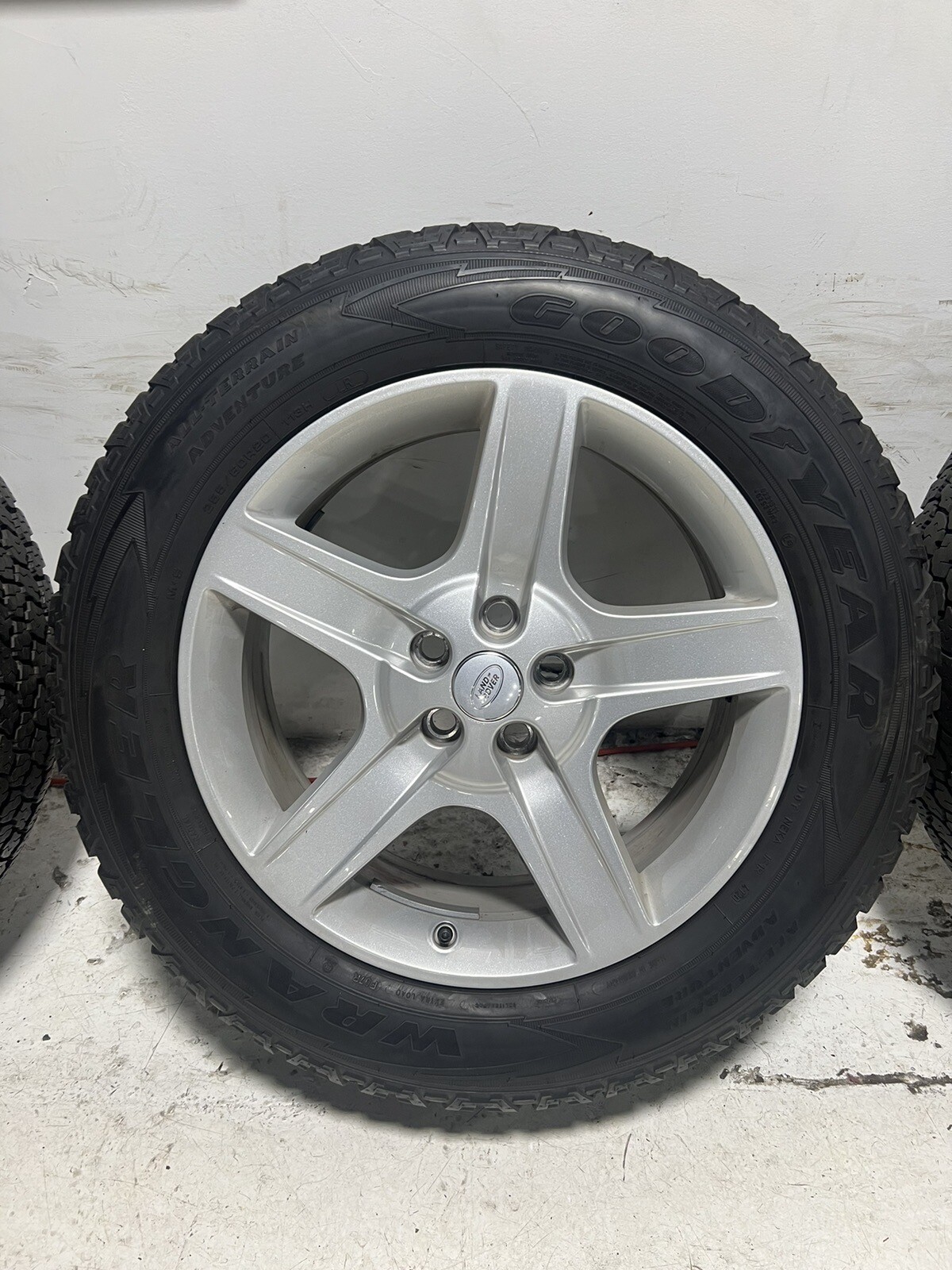 Land Rover Defender OEM Silver wheels and Off Road Goodyear tires 255 ...