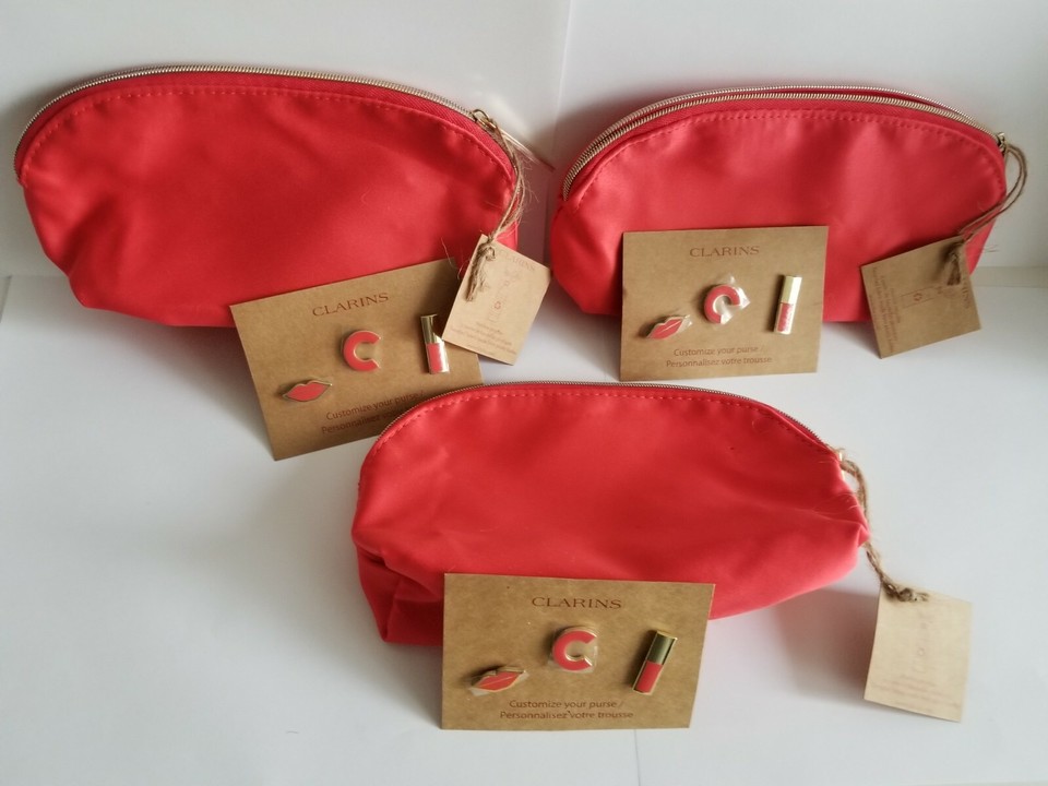 CLARINS PINK COSMETIC TRAVEL BAG WITH CLARINS LOGO PINS . BUY 1,2 OR 3 ...