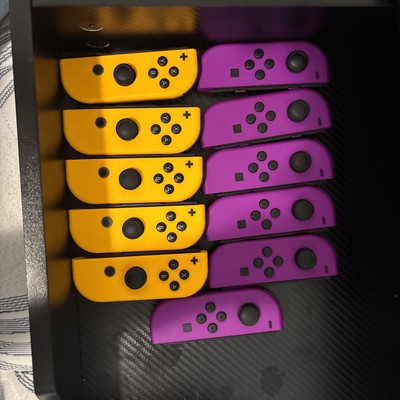 Nintendo Switch Joycons (Orange and Purple) | eBay