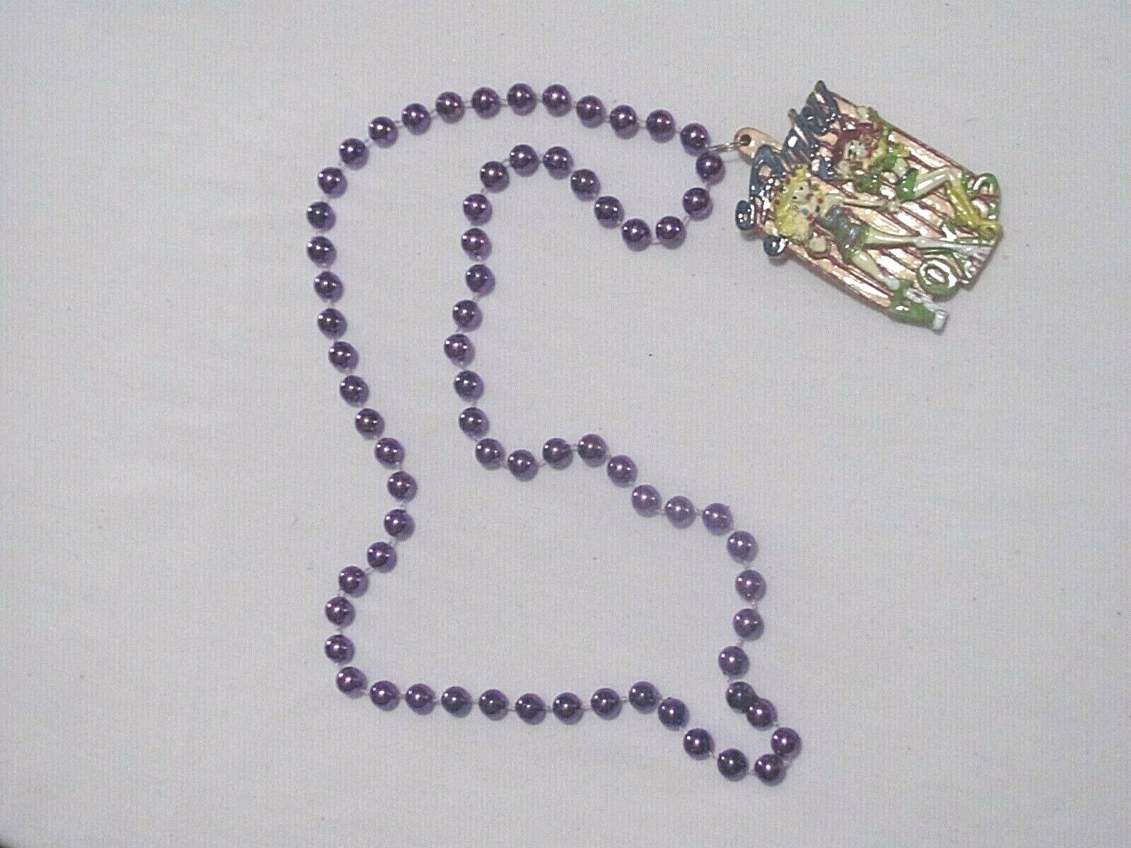 KREWE OF TUCKS POLYSTONE "FUNKY FOXES" EMBLEM ON A PURPLE MARDI GRAS ...