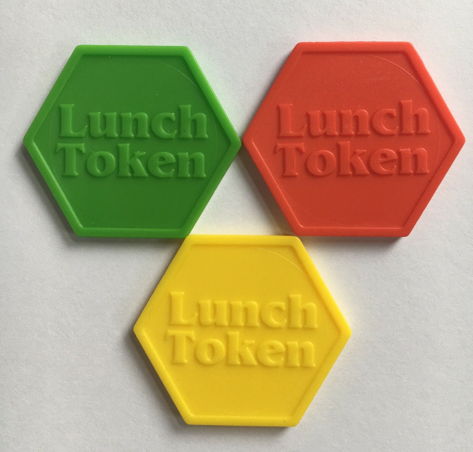 PLASTIC LUNCH TOKENS HEXAGON EMBOSSED - 3 COLOURS - BAG OF 100 - CAFE ...