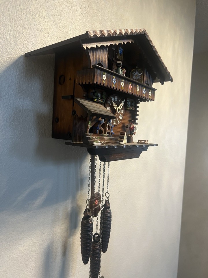 Cuckoo Clock Wood Features a Cuckoo Bird Emerges To Make A “cuckoo ...