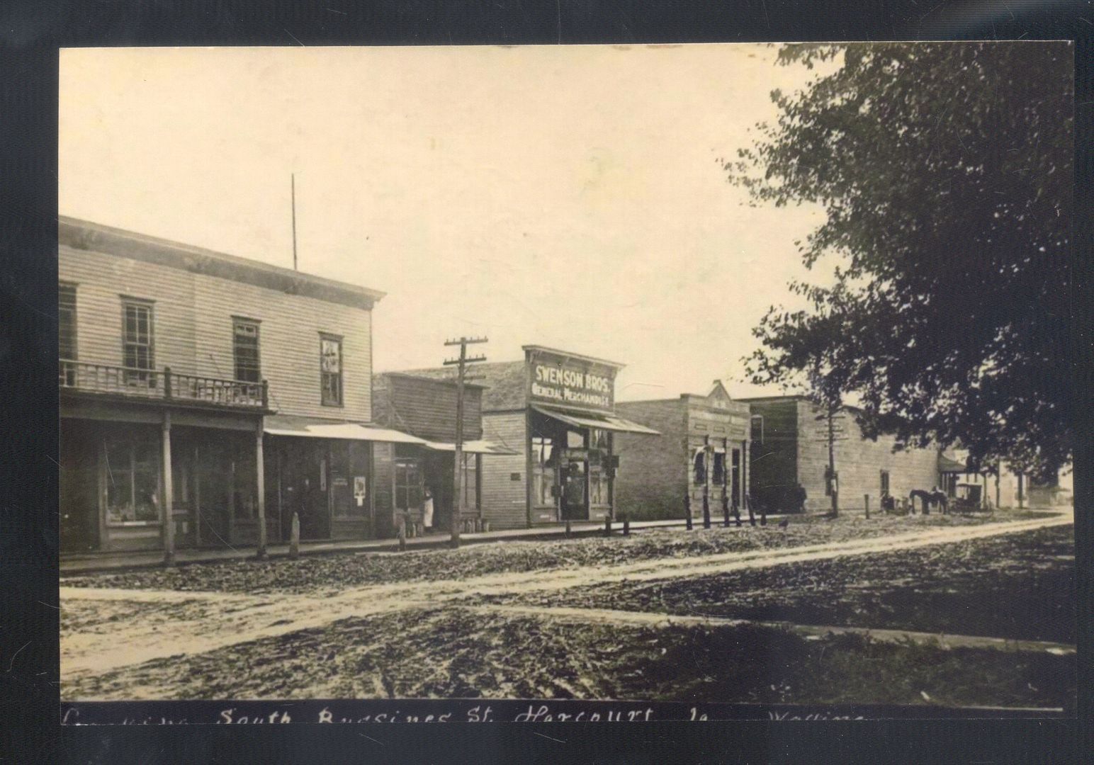 REAL PHOTO HARCOURT IOWA DOWNTOWN DIRT STREET SCENE STORES POSTCARD ...