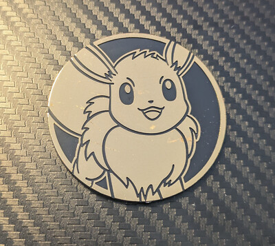 Pokemon Trading Card Game Large Gold Eevee Coin Prismatic Evolutions | eBay