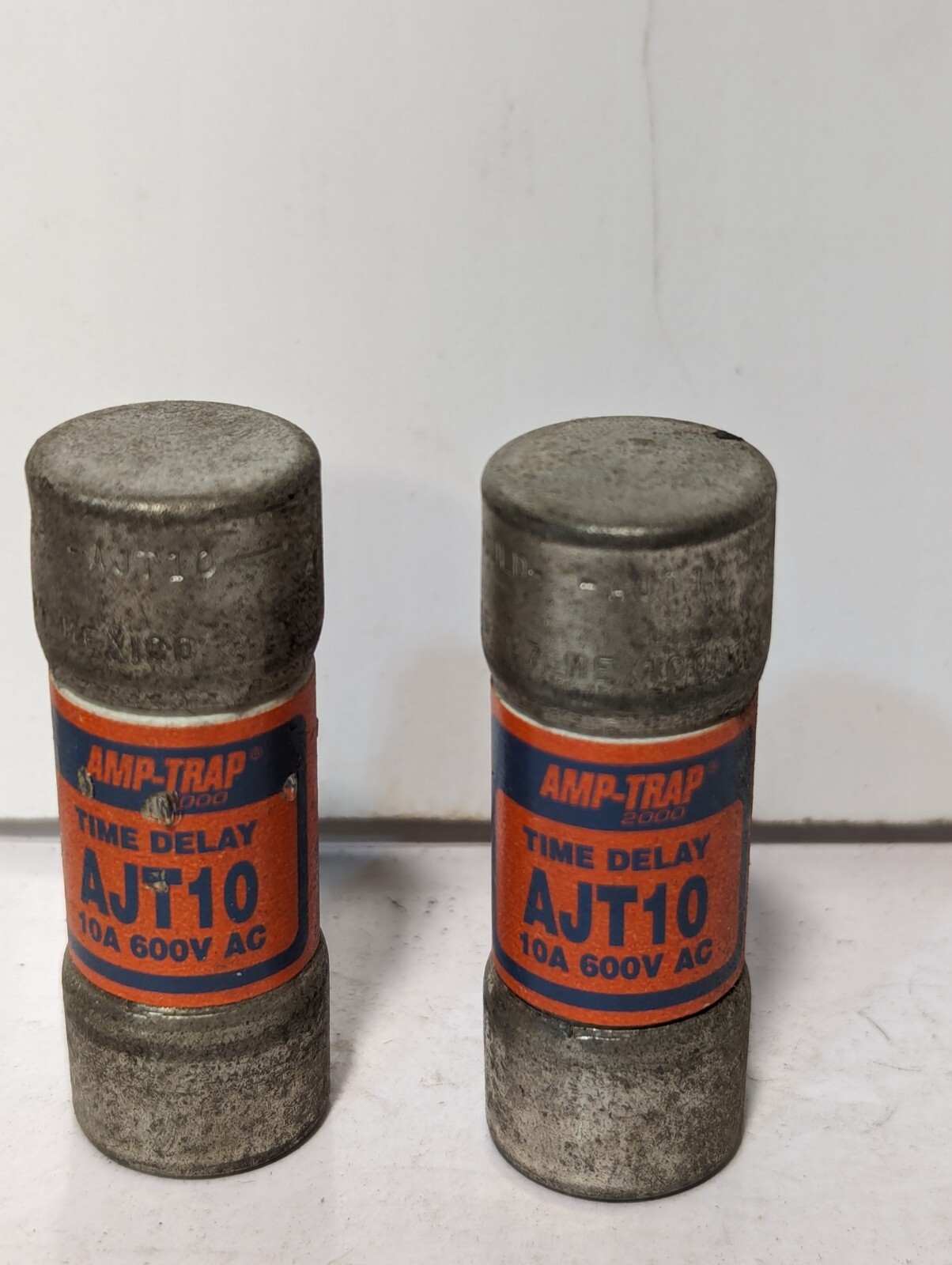 Lot of 2 AJT10 fuses, 3 AJT8 fuses, 8 and 10A, resp., 600VAC, time ...