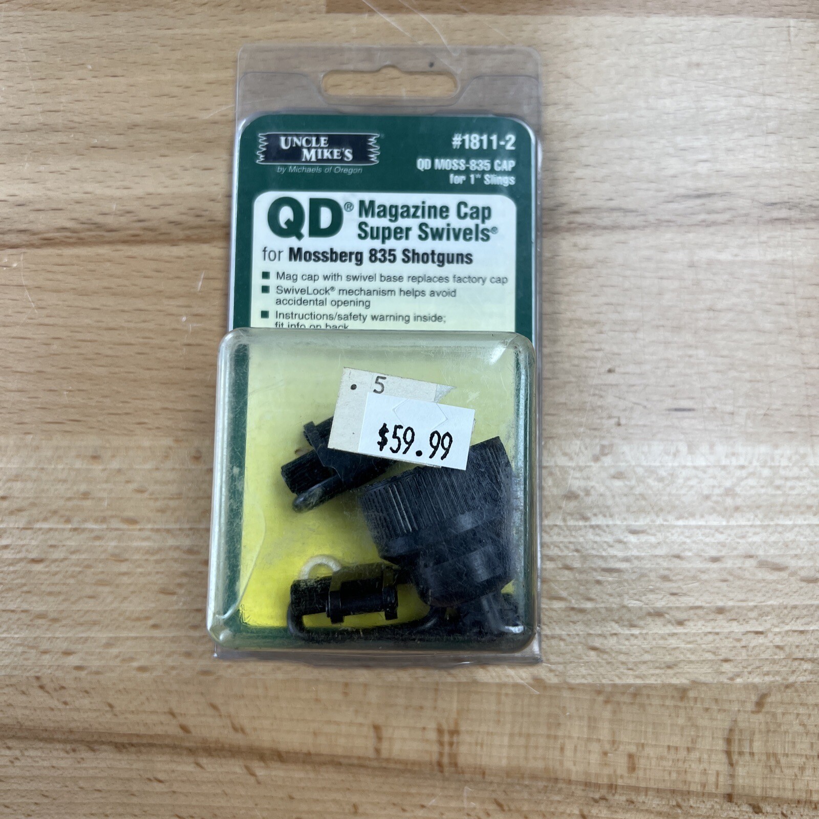 Mossberg- 590/835 - 12 ga. Magazine Cap w/Sling Swivel Uncle Mikes ...