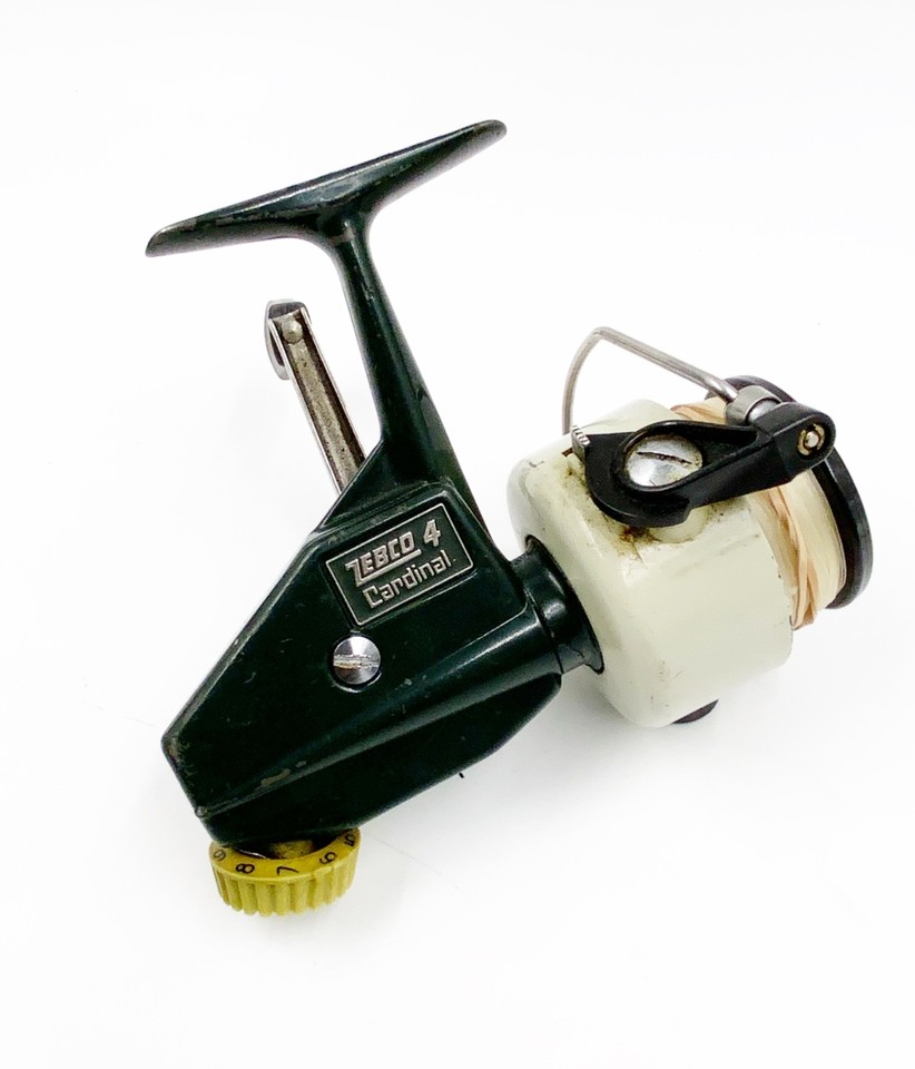2 Abu Garcia Zebco Cardinal 4 Spinning reels 1 with box paper & parts ...