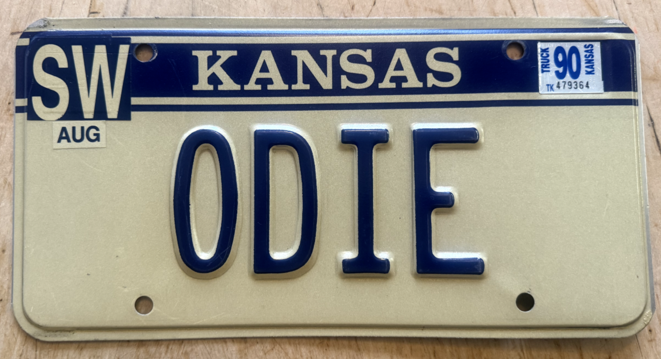 1990 KANSAS GRAPHIC VANITY AUTO LICENSE PLATE " ODIE " KS OD OLDIE O.D ...