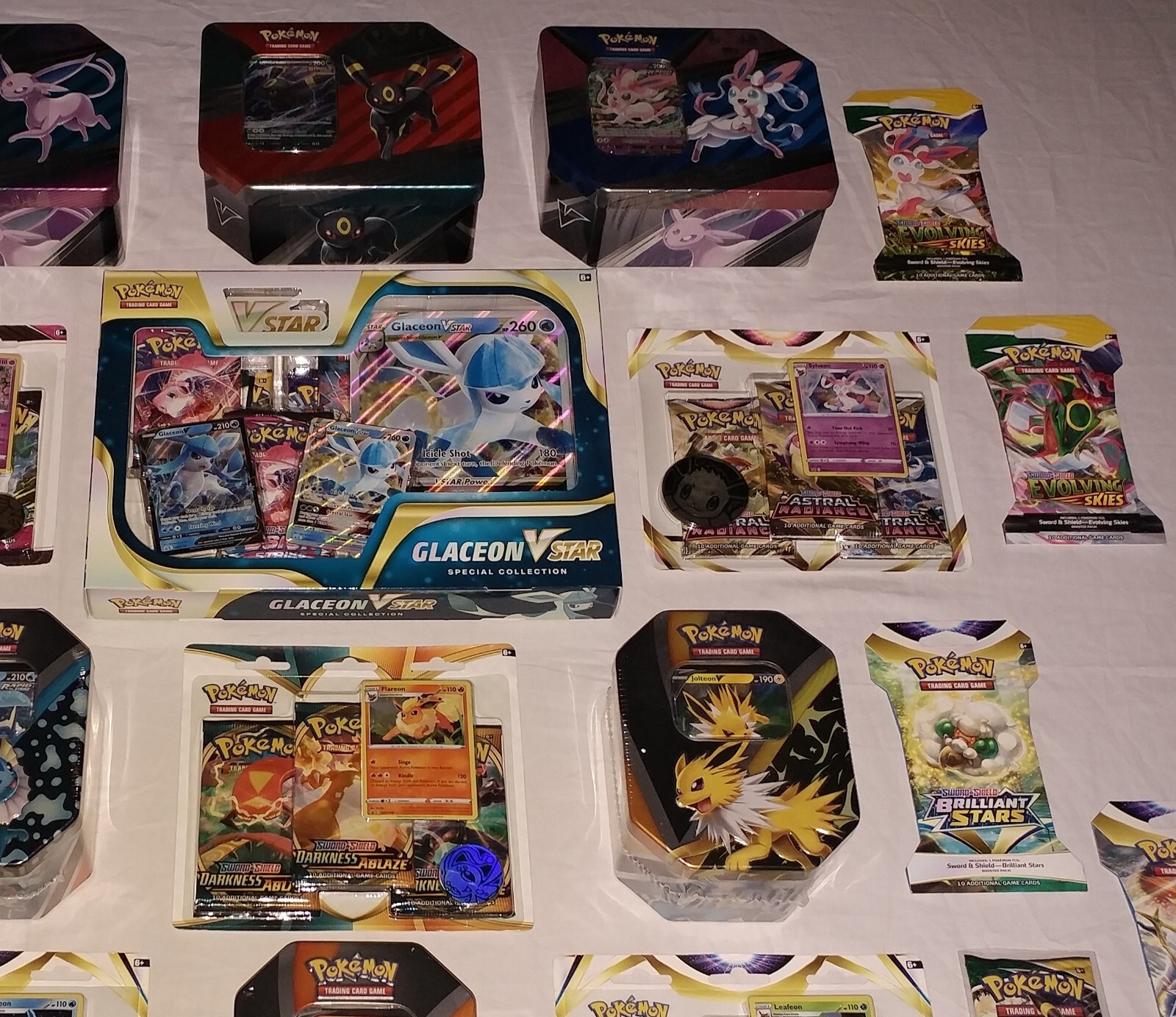 57 Pokemon Packs 🤗Tins - 3 Pack Blister Packs - 14 Evolving Skies Packs ...