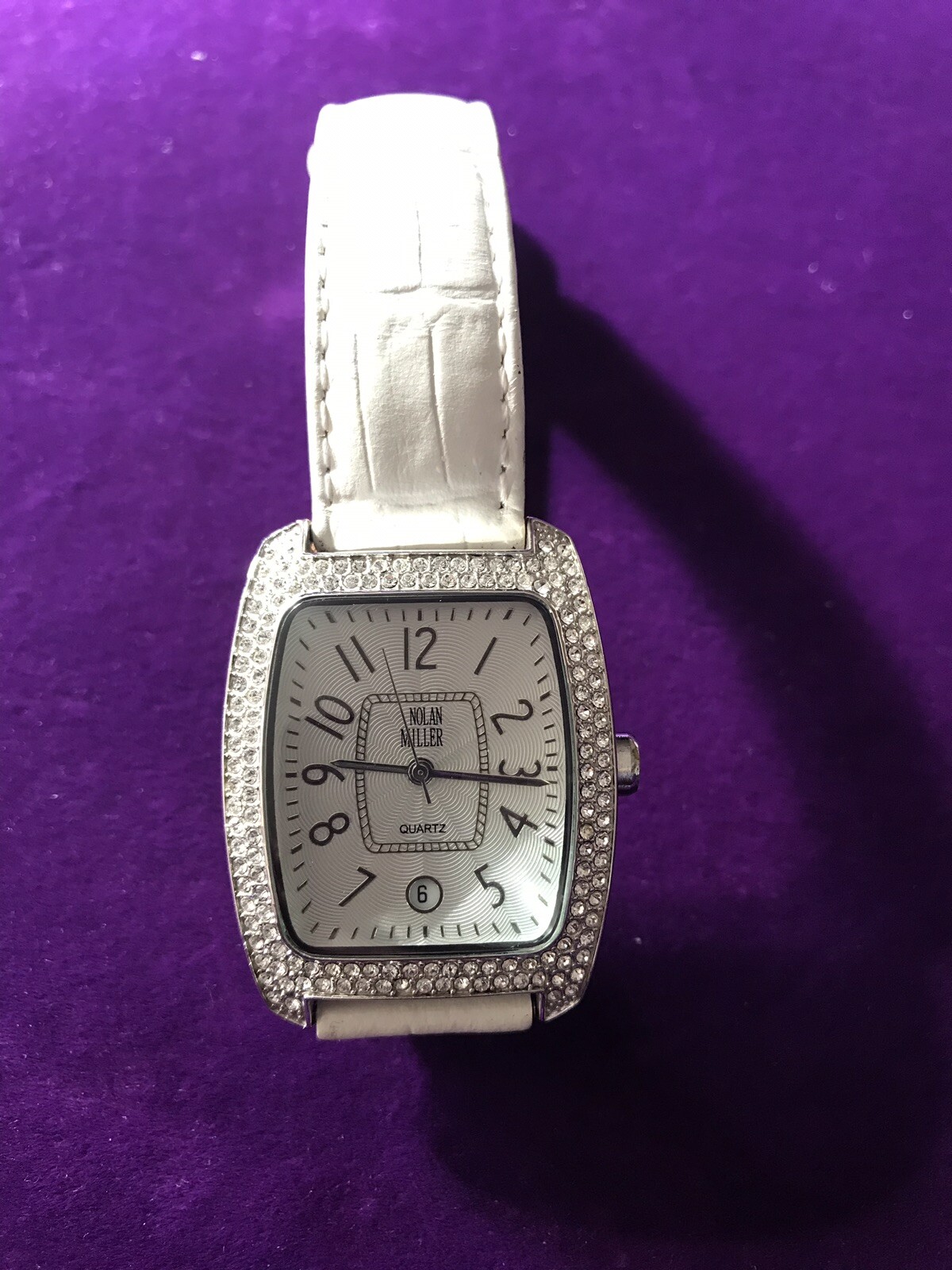 NOLAN MILLER CRYSTAL BEZEL WHITE LEATHER BAND SILVER DIAL QUARTZ WOMENS ...
