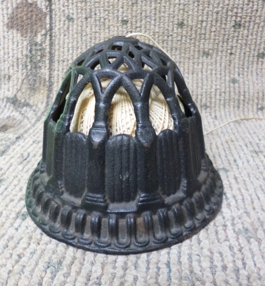 Antique Cast Iron String Holder