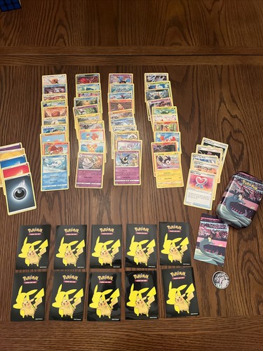 Pokémon Trading Card Lot-50 Cards, Tin, Coin And Sleeves | eBay