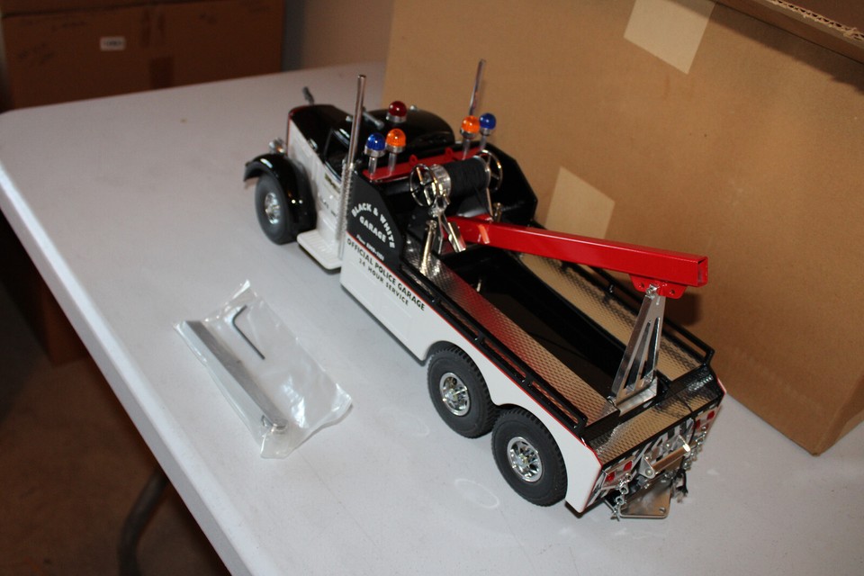 Elegant Black White Towing Auction Gallery