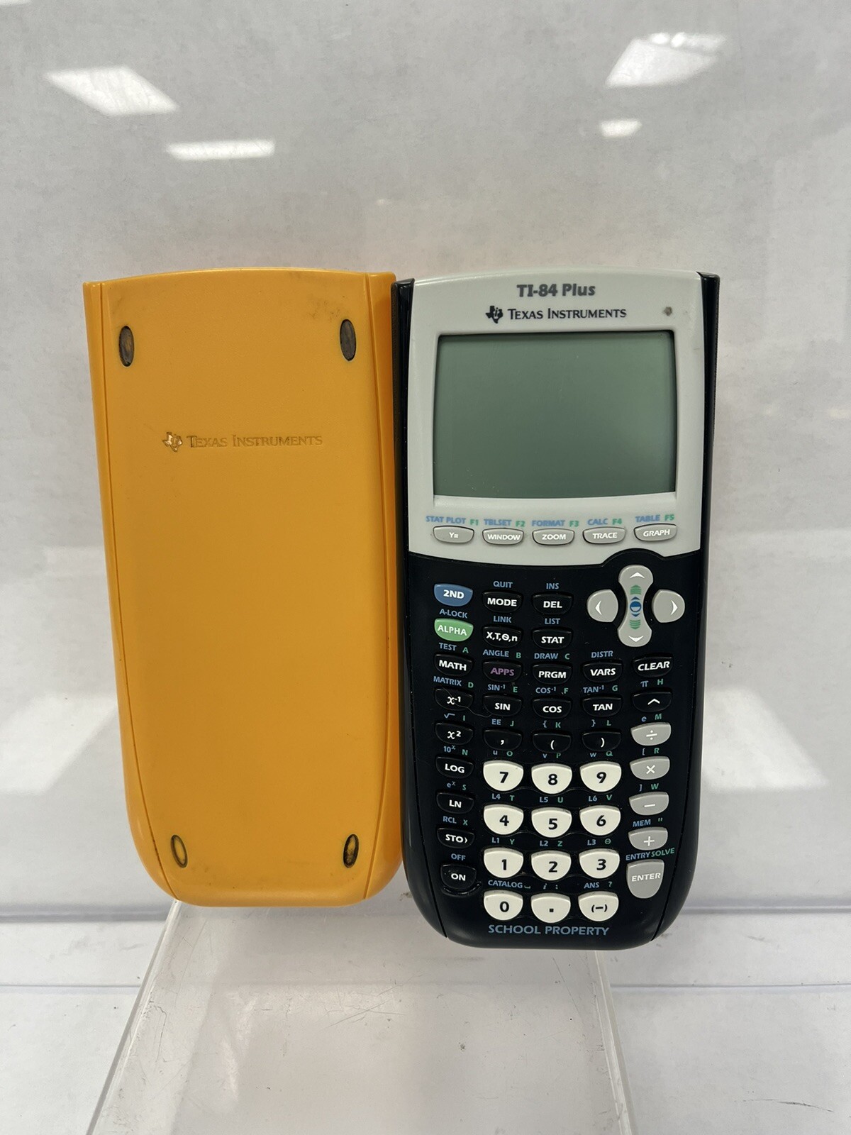 Texas Instruments TI 84 PLUS Calculator School Edition With Yellow texas-instruments-ti-84-plus-calculator-school-edition-with-yellow