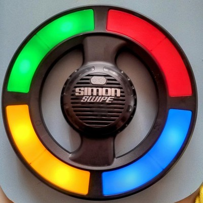 Simon Swipe Hasbro Toys 2013 Handheld Light Up and Sound Memory Game ...