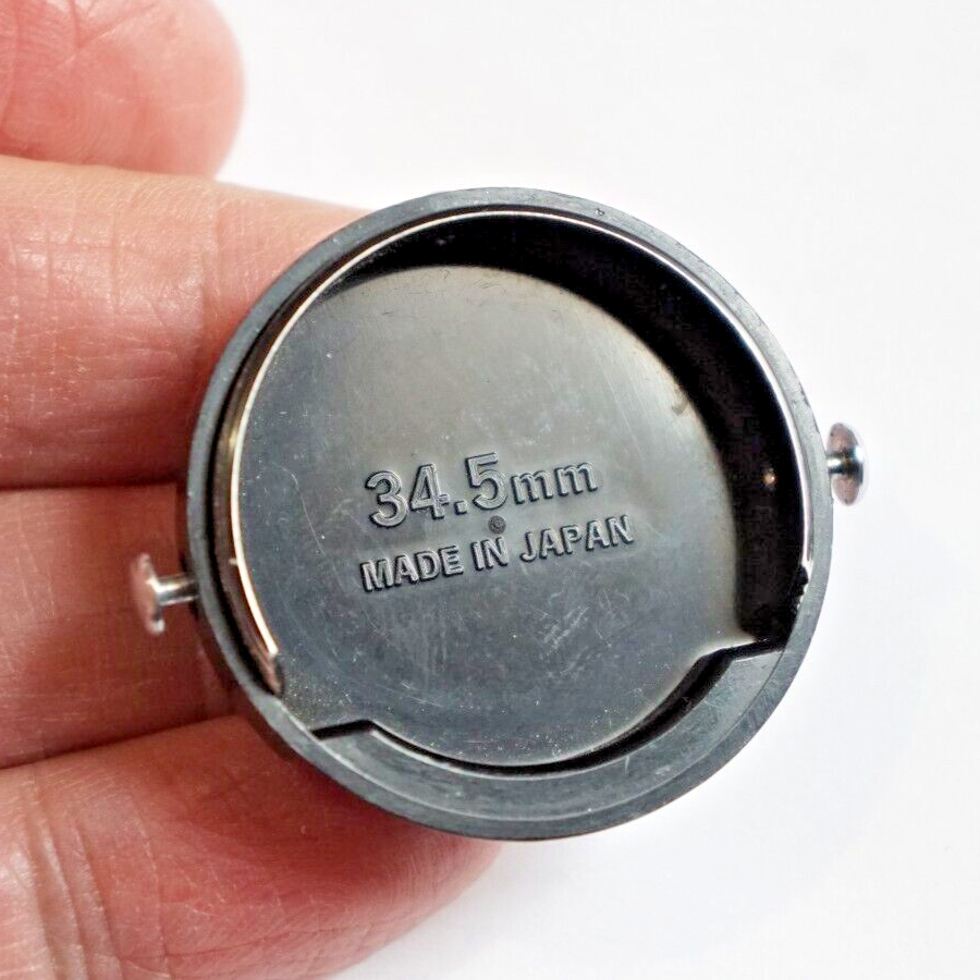 NIKON 34.5mm VINTAGE FRONT LENS CAP Silver Pins #940 | eBay