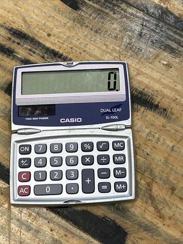 Casio SL-100L Dual Leaf 8 Digit Solar Powered Folding Calculator | eBay