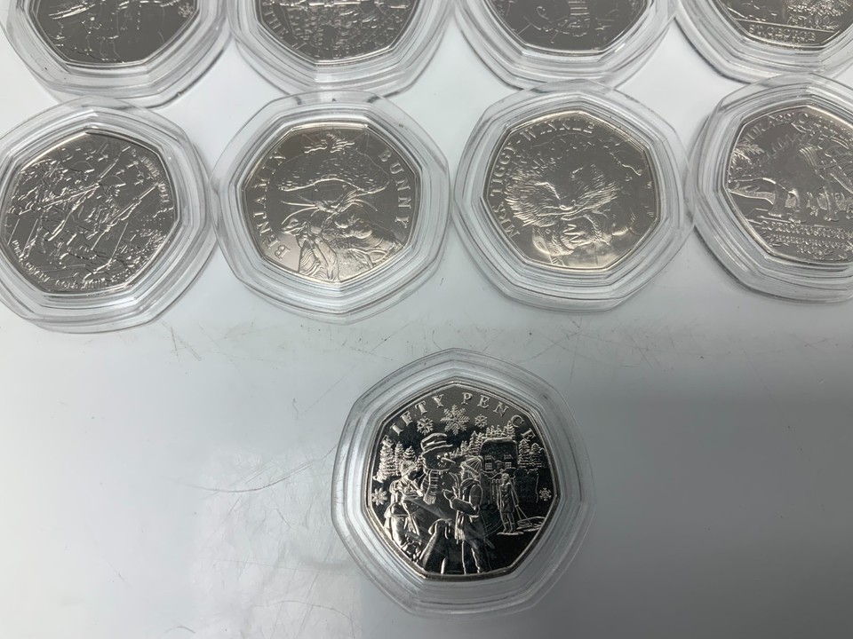 Assorted 50 Pence 50p Coin Collection 9 Coins Uncirculated in Cases ...