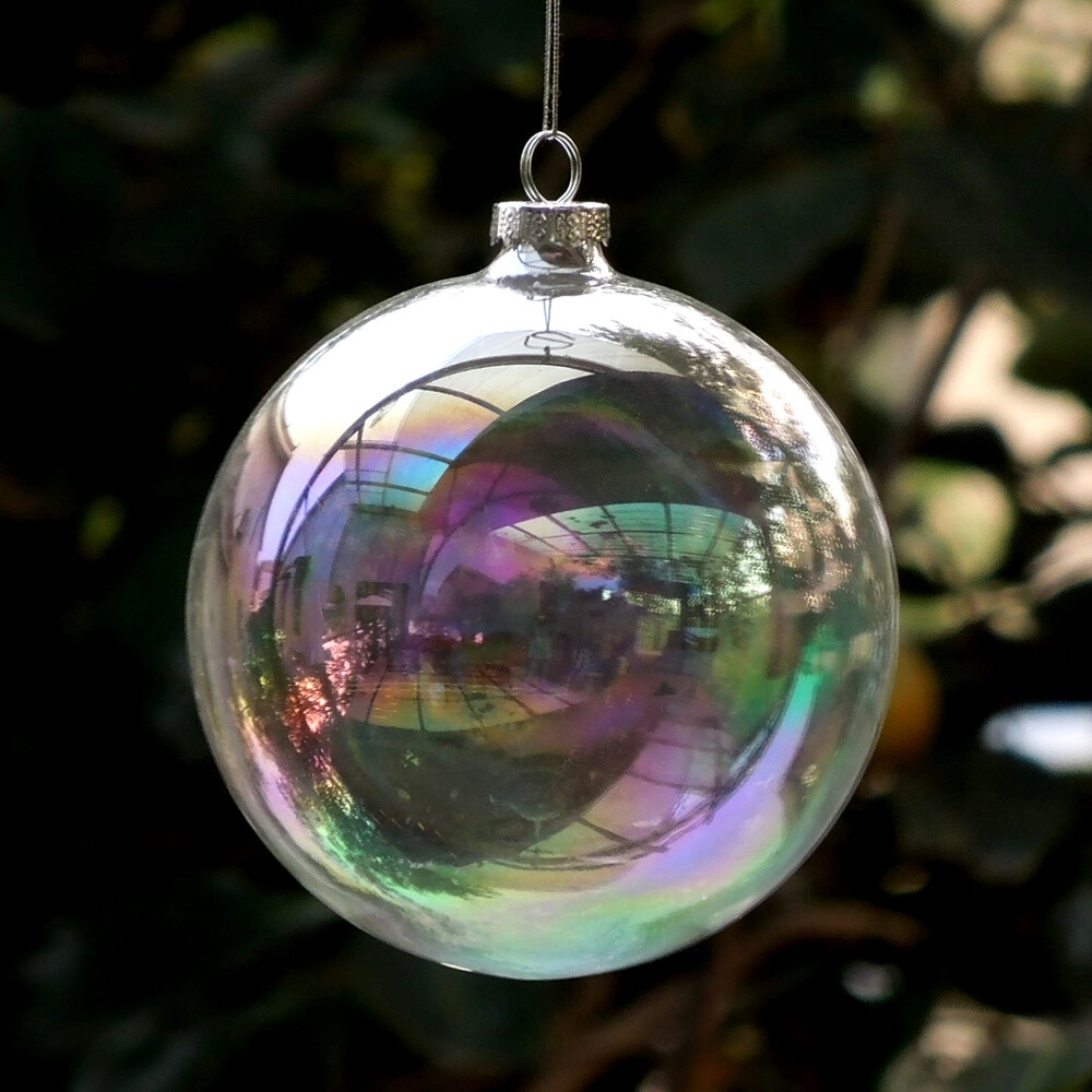 Glass Bubbles For Christmas Dripping In Gold Trimmings And Iridescent