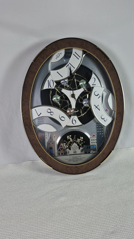 Cuorum Small World Rhythm 18" x 14" Magic Motion Musical Wall Clock | eBay