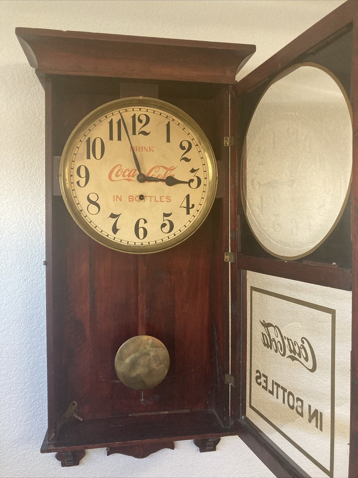 vintage coke wall clock. 100 Year Old Coke Cola Advertisement Wall ...