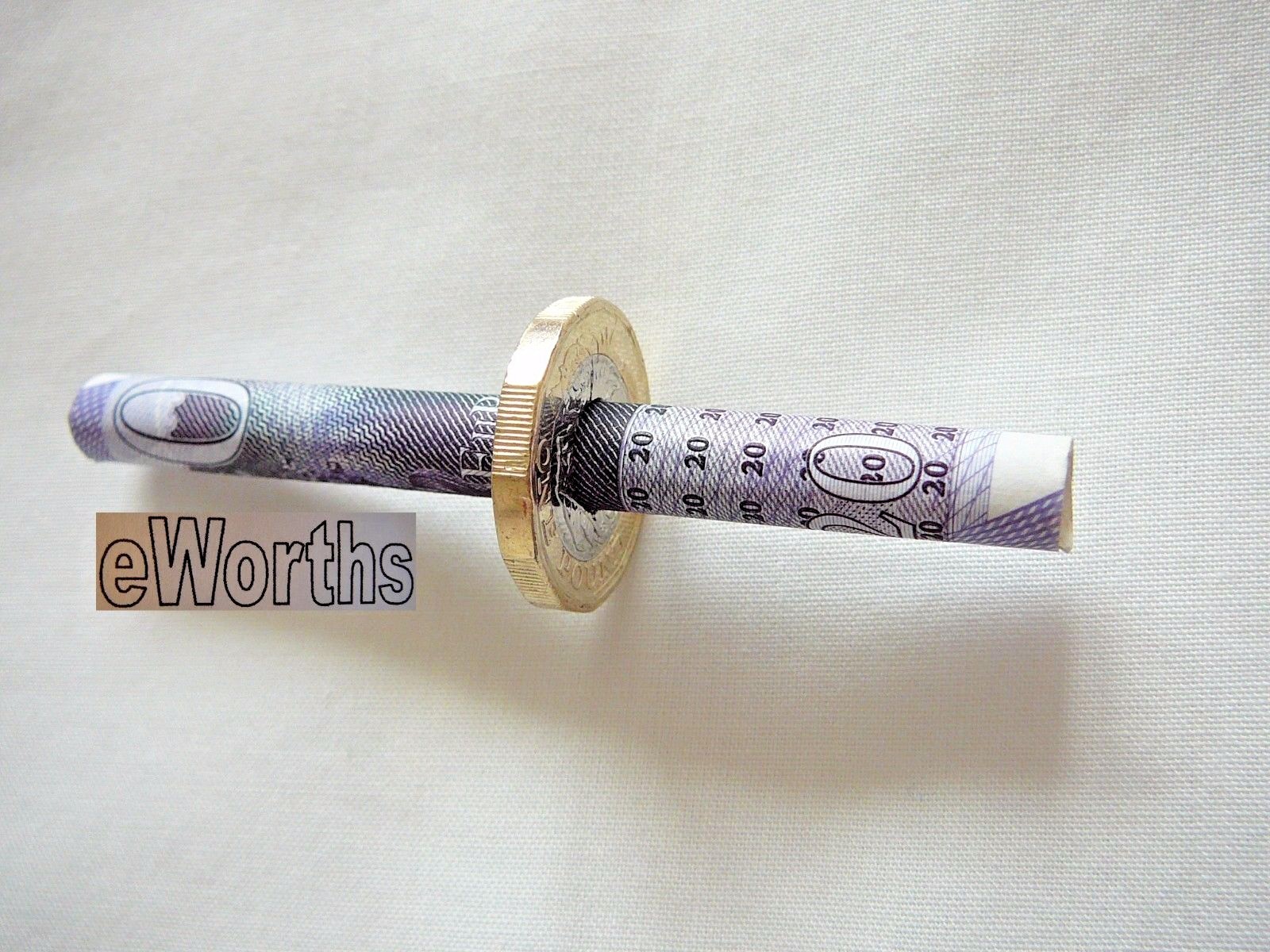 CIGARETTE THROUGH £1 COIN magic TRICK (new shape 12 sided coin ...