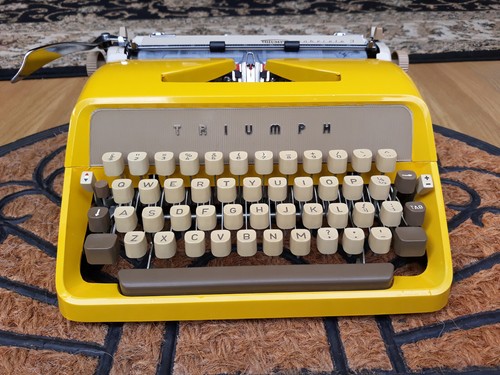 vintage mustard yellow Triumph portable typewriter working with case | eBay